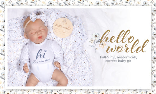 Meet Paradise Galleries Hello World, full vinyl, posable realistic doll